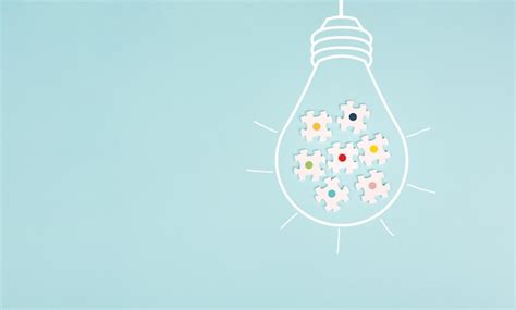 Premium Photo Light Bulb With Jigsaw Or Puzzle Pieces Brainstorming