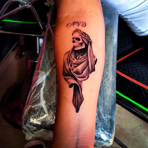 Santa Muerte Tattoos For Forearm Meaning Design And Placement Guide