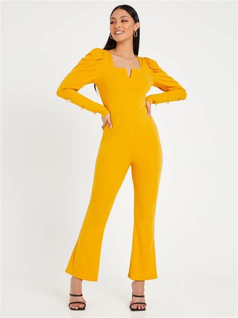 اشتري جمبسوت بقصة واسعة وازرار أصفر ل النساء ستايلي السعودية