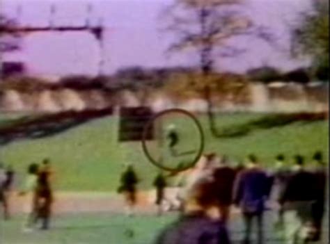 Police Officer Runs After Gunman
