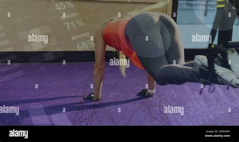 Image Of Statistical Data Processing Over Caucasian Woman Performing Abs Exercise At The Gym
