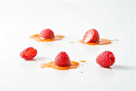 Raspberry And Caramel Sauce Drizzle On White Background 48150616 Stock