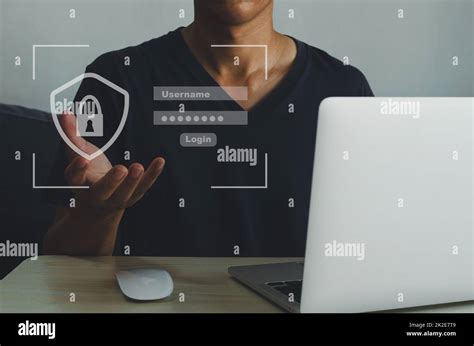 Man Using Computer Laptop Login Page Username And Password On A Virtual Screen Business