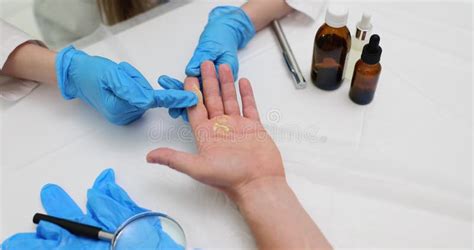 Assistant Applies Special Cream To Finger For Analysis Stock Video