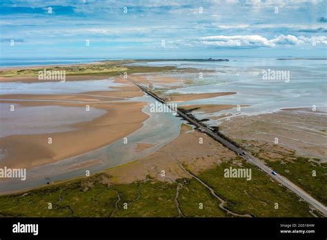 Aerial View Of The Lindisfarne Holy Island Causeway That Links It To