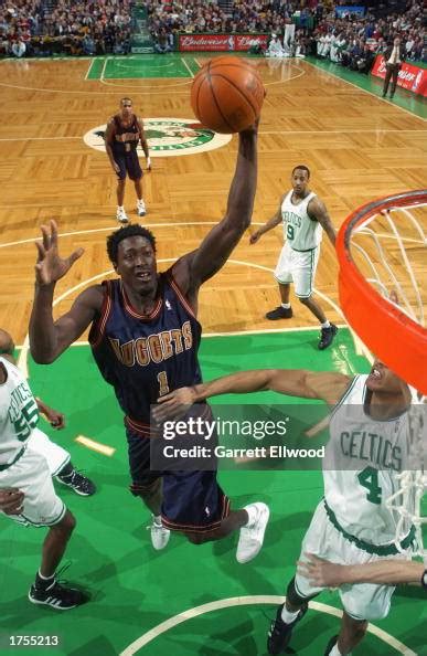 Donnell Harvey Of The Denver Nuggets Takes The Ball To The Basket