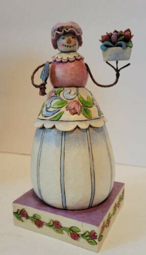 Js Snowman With Flowers Poynters Christmas