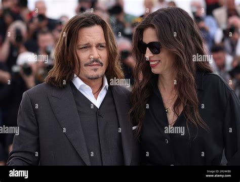 Johnny Depp Left And Director Maiwenn Pose For Photographers At The