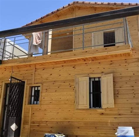 بناء بيوت خشبية