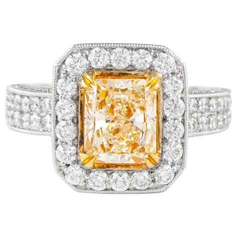 Alexander 450ct Fancy Intense Yellow Radiant Diamond With Halo Ring