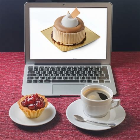Premium Ai Image Computer Laptop With Mouse And Coffee Cup On Table