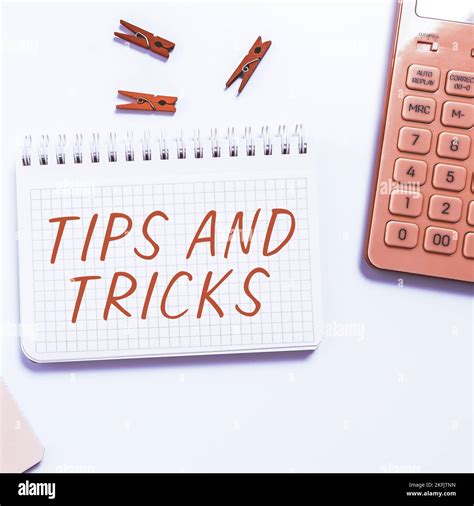 Sign Displaying Tips And Tricks Word Written On Helpful Advices That Makes Certain Action