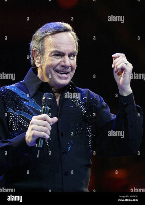 Singer Neil Diamond Entertains The Crowds At The Savvis Center During