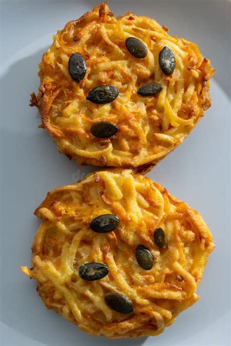 Pumpkin Grated Roasted Patties Rosti Or Latkes Made Fron Squash And Potato Decorated With
