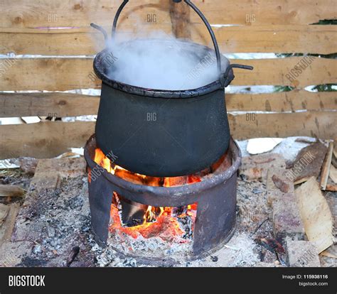 Cooking Pot On Fire