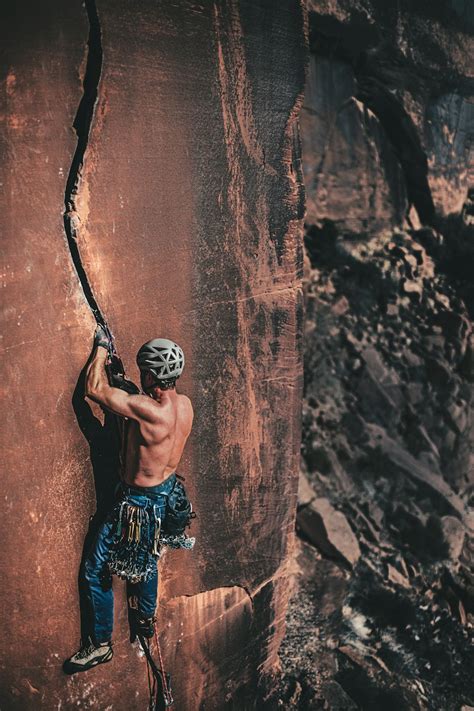 Topless Man Rock Climbing Photo Free Sport Image On Unsplash