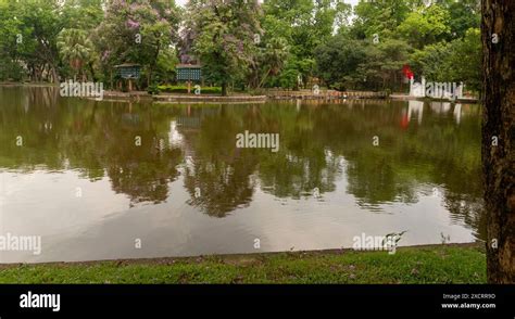 Stunningly Beautiful Dovecots Across The Lake On An Island In Jardín Botánico De Hanói Hanoi
