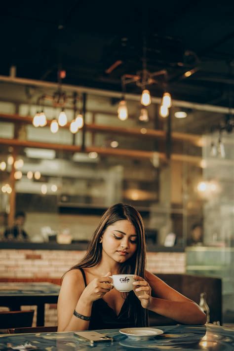 Girl Sitting In A Cafe Photos Download The Best Free Girl Sitting In A