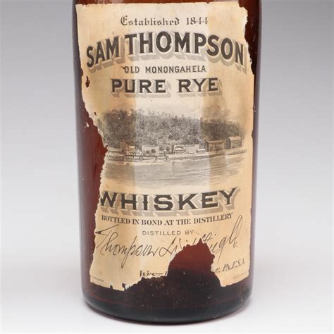 Old Fitzgerald Flagship Decanter With Other Decanters And Rye Whiskey