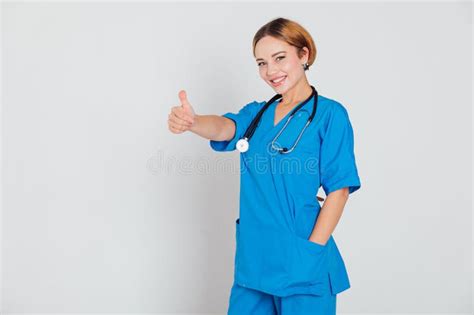 Woman Doctor With Stethoscope Showing Class With Hand Stock Image