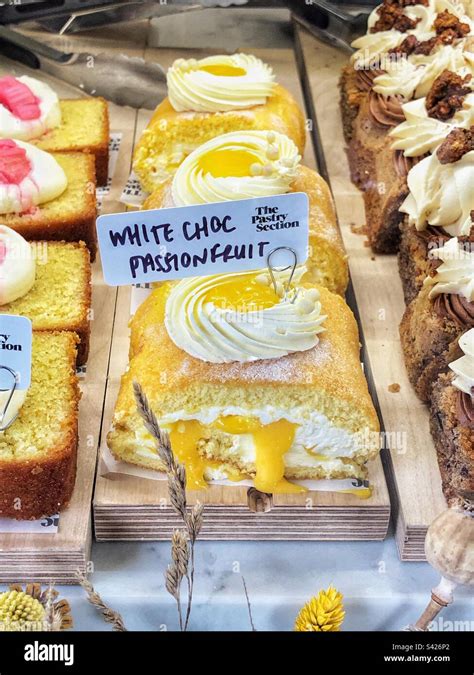 White Chocolate Passion Fruit Swiss In Bakery Window Display Stock