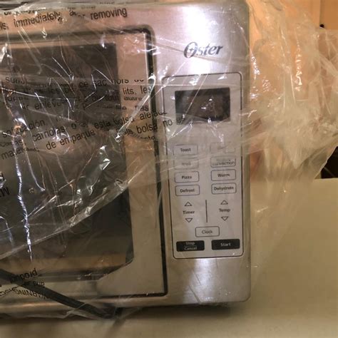 Lot 179m Never Used Oster French Door Countertop Oven Model