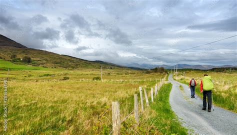 Hikers Ascend A Trail On A Cloudy Day In The Killarney National Park Hiking In County Kerry