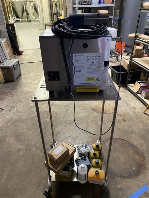 Domino Ax 150i Label Applicator And Printer Mandm Equipment Corp