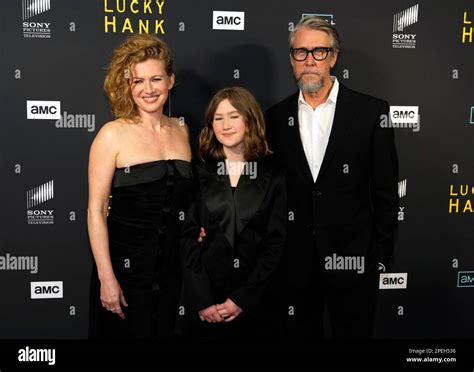 Mireille Enos Left And Husband Alan Ruck Pose With Their Daughter
