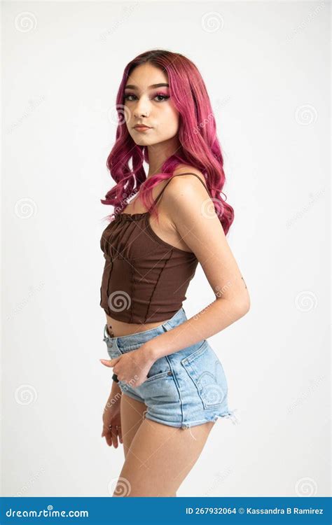 Young Alternative Model With Pink Hair Modeling White Photography