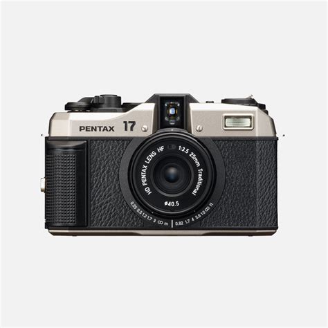 Compact Film Camera With Fixed Focal Length Designed To Capture Half