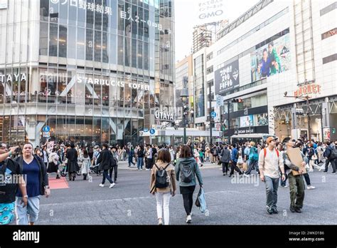 Shibuya Scramble Crossing At Shibuya Rail Station Crowds At The