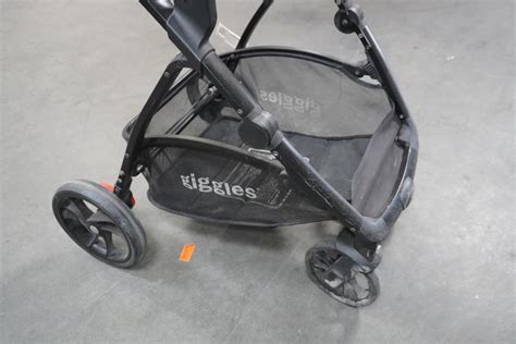 Giggles Black Rolling Push Stroller Property Room