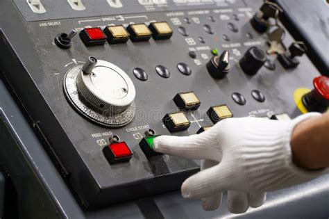 Machine Operator Presses The Green Start Button On The Cnc Machine S Control Panel Industrial
