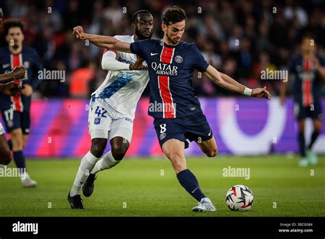 Elisha Owusu Of Auxerre And Fabian Ruiz Of Psg During The French