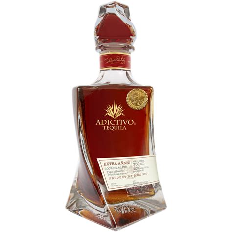 Download Premium Adictivo Extra Anejo Tequila In Red Bottle Wallpaper