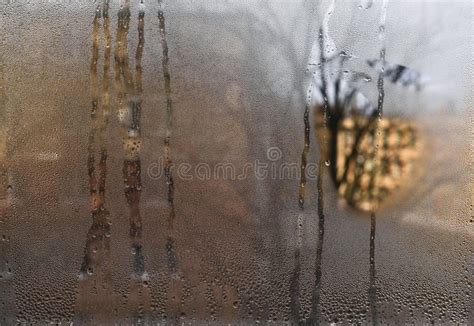 Heavy Condensation Covers With Glass Pane Distorting Light And Shapes