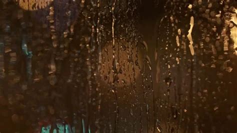 Raindrops Run Down The Window Glass With Stock Video Pond5