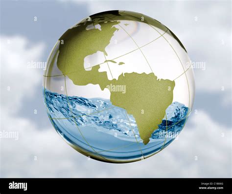 A Glass Globe With Water Sloshing Around Inside In A Concept Image For