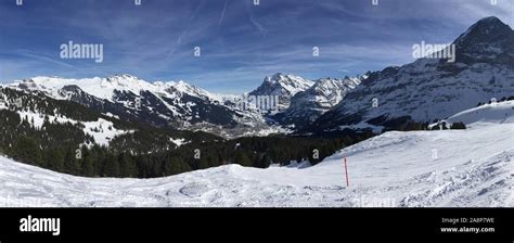 The Wengen Ski Resort In Switzerland With A Panoramic View Of Snow