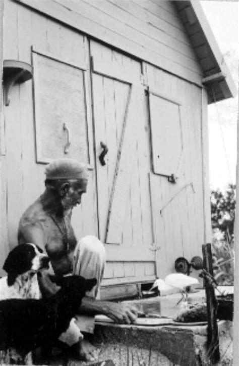 Florida Memory • Old Hermit Roy Ozmer Watching A Water Bird By His