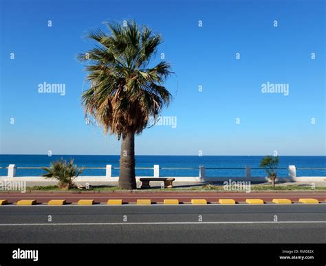 Waterfront Road And Promenade On The Beach With Skyline And Horizon Of