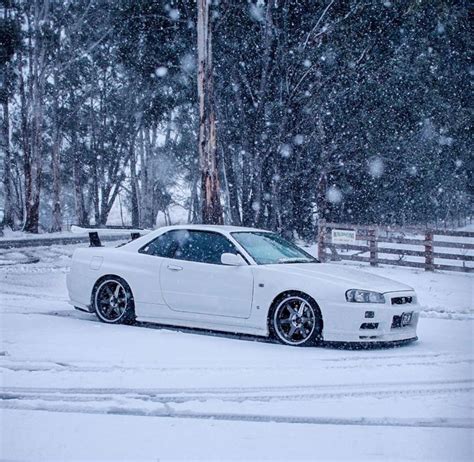 White Nissan Gtr R34 Parked In The Snow