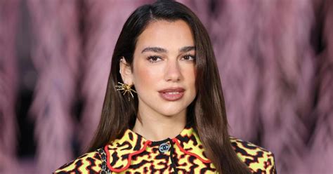 Dua Lipas Gucci Tiger Print Faux Fur Coat Screams Luxury Mob Wife