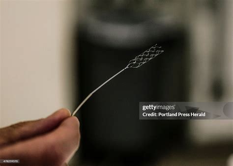 Doctor Robert Ecker Holds A Device Called A Stent Retriever Which Is