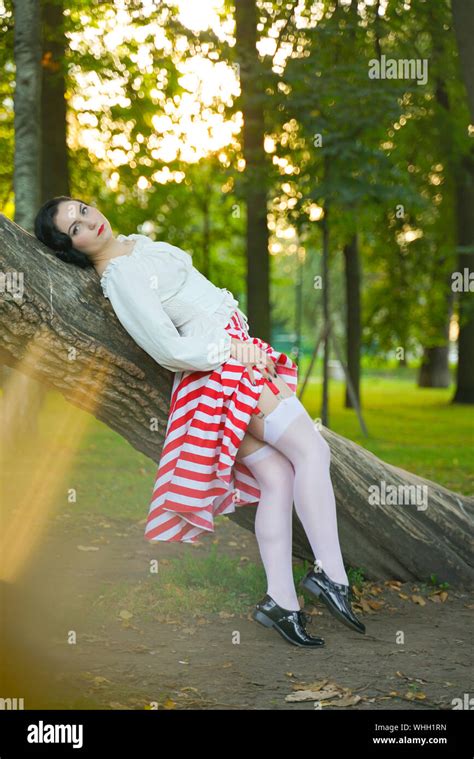 Cute Fashion Lady In Summer Dress Posing In The Summer City Park Stock