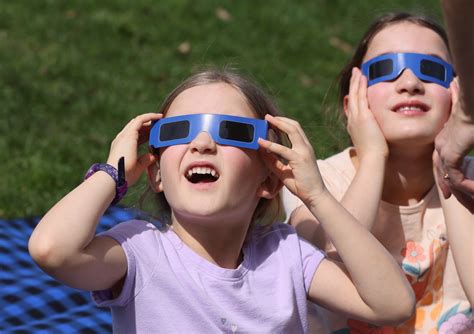 Eyes Glued To The Sky Solar Eclipse Wows Massachusetts New England