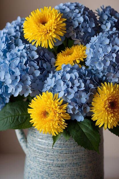 Premium Photo Bouquet From Blue Hydrangeas And Yellow Asters A Flower