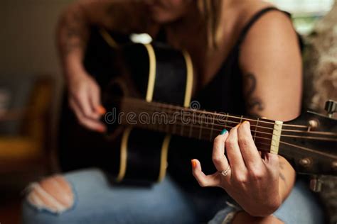 Woman Hands And Guitar In Home For Music Practice And Learning Chords