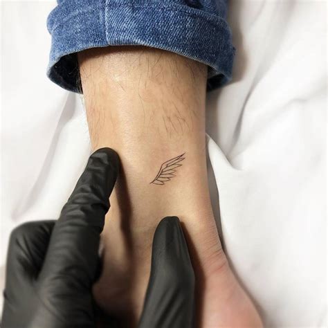Abstract Minimalistic Wing Tattoo Patterns For Elegant Design